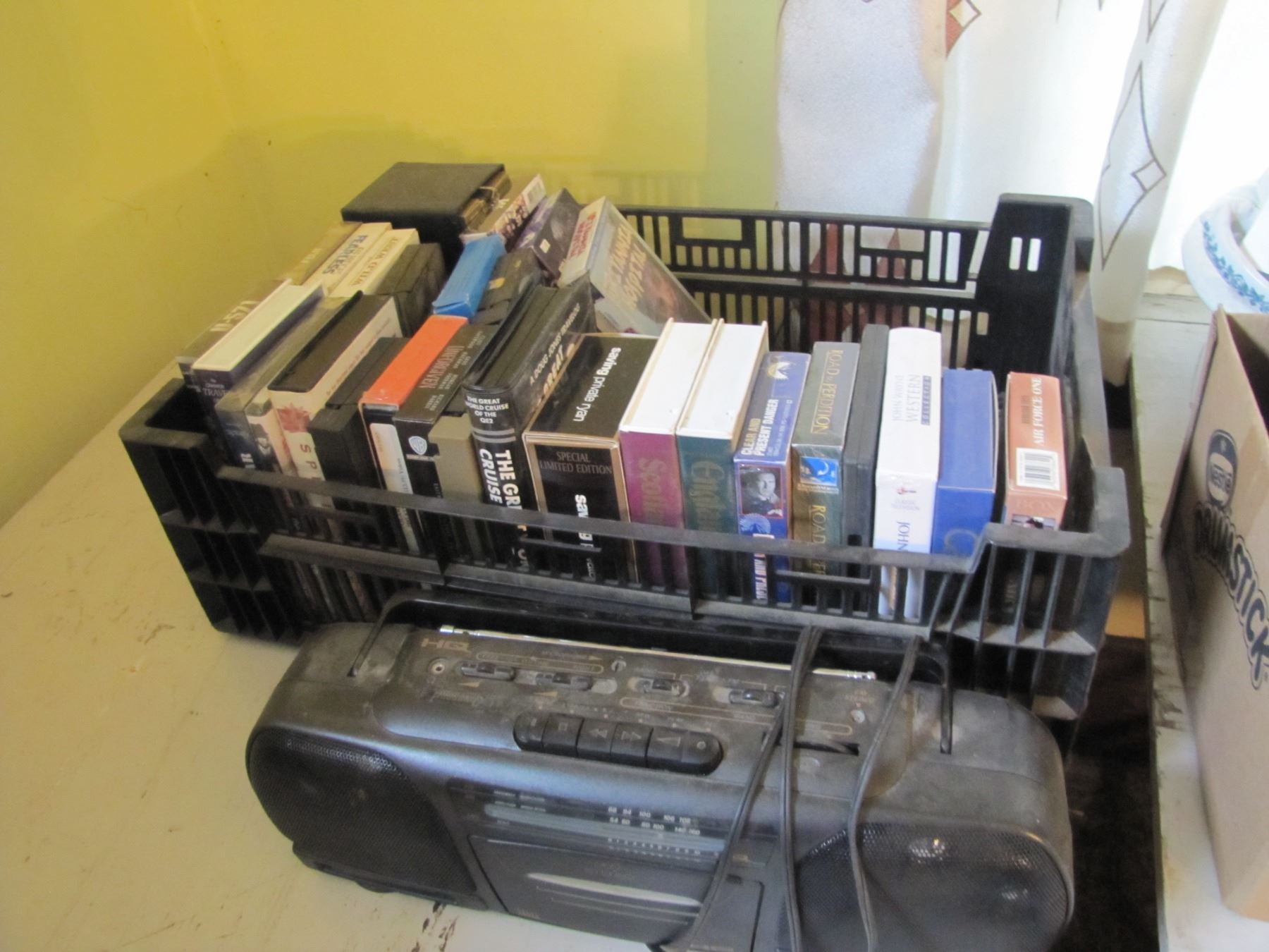 Lot of VHS tapes , radio , Sony VHS tape player , radio and cd player ...