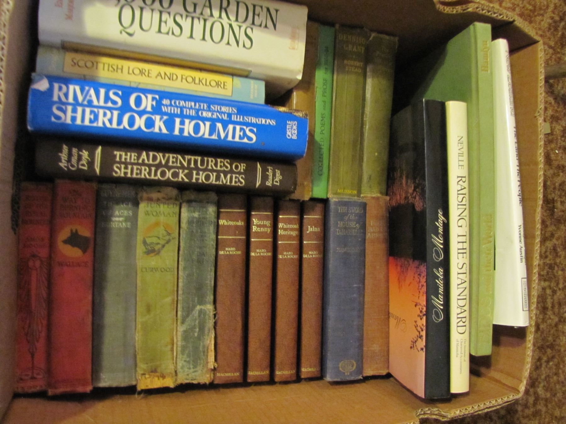 Banana box of assorted books