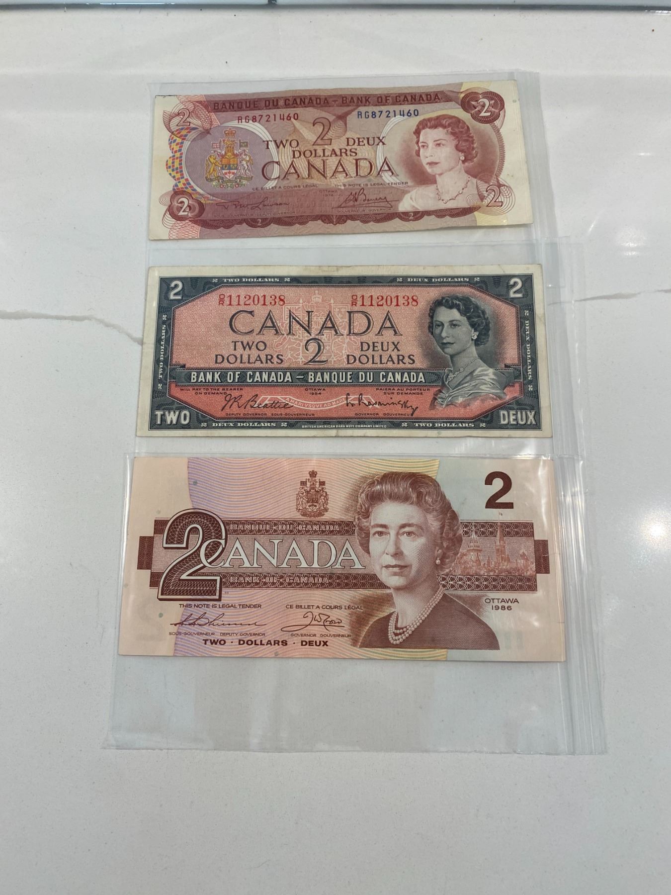 3 Canada $2 bills