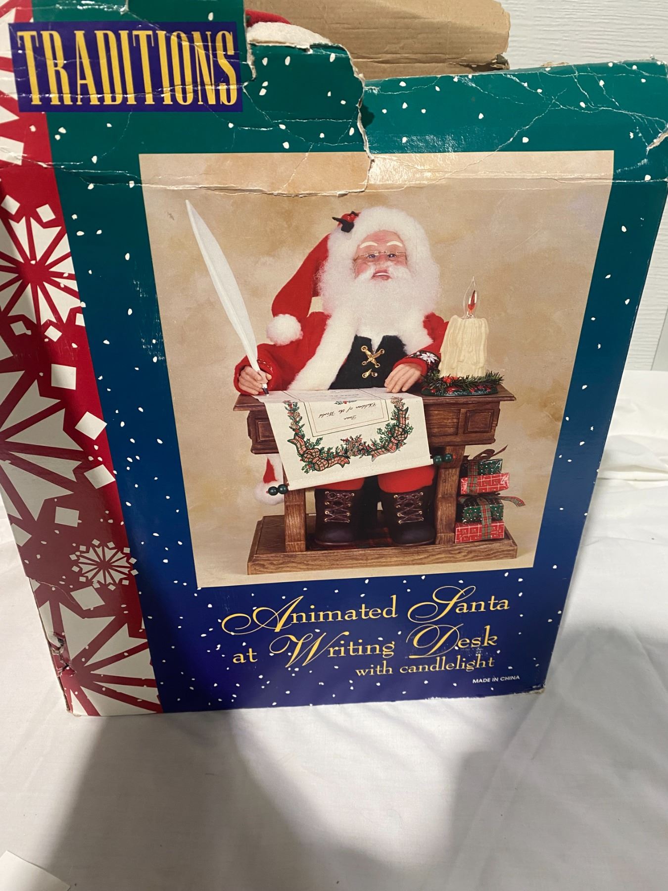 Animated Santa at writing desk
