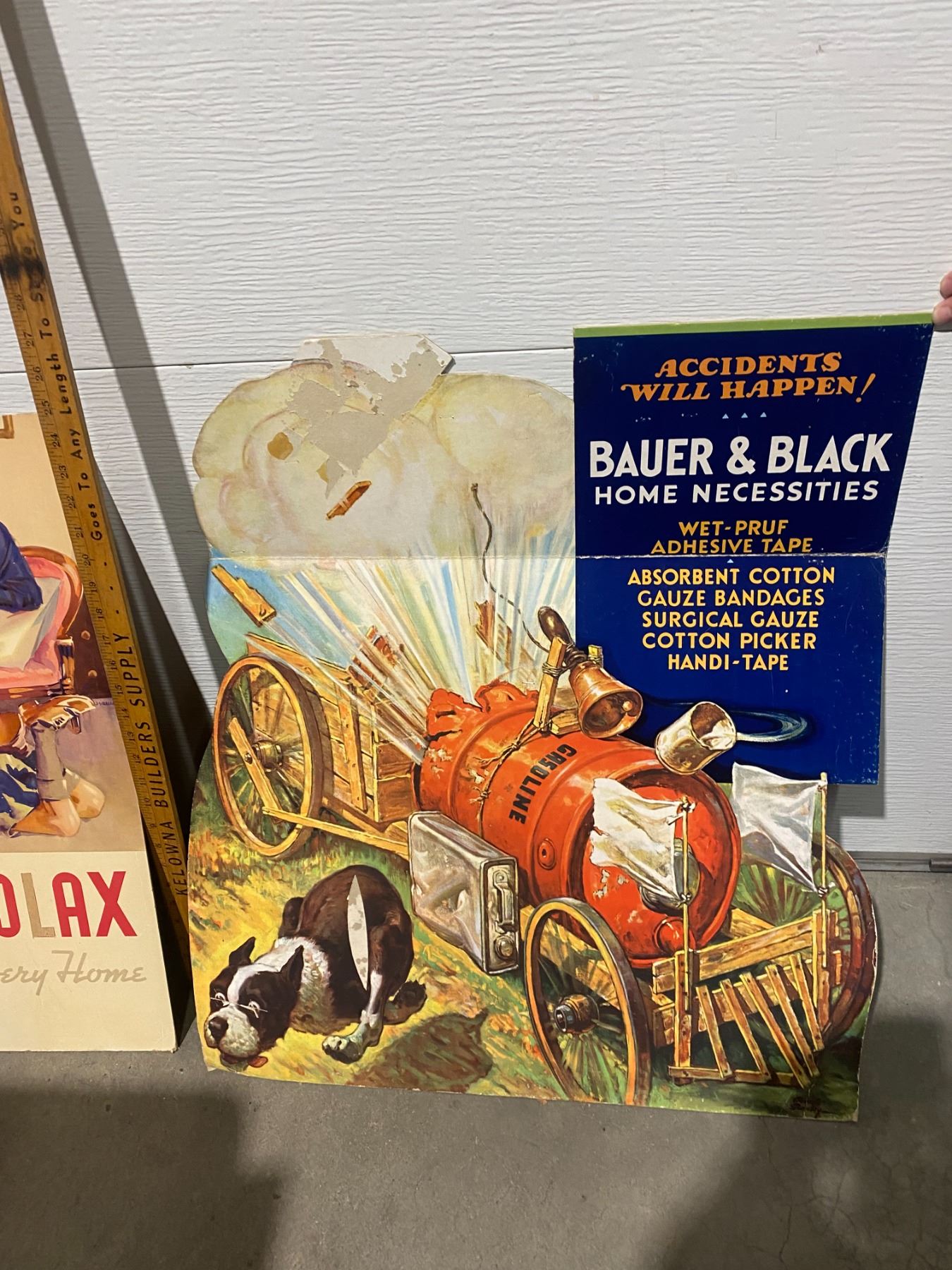 Cardboard sign Bauer & Black (medical) gasoline dog