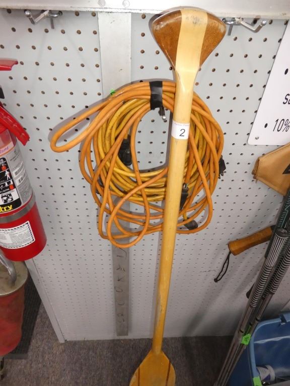 wooden oar, extension cord