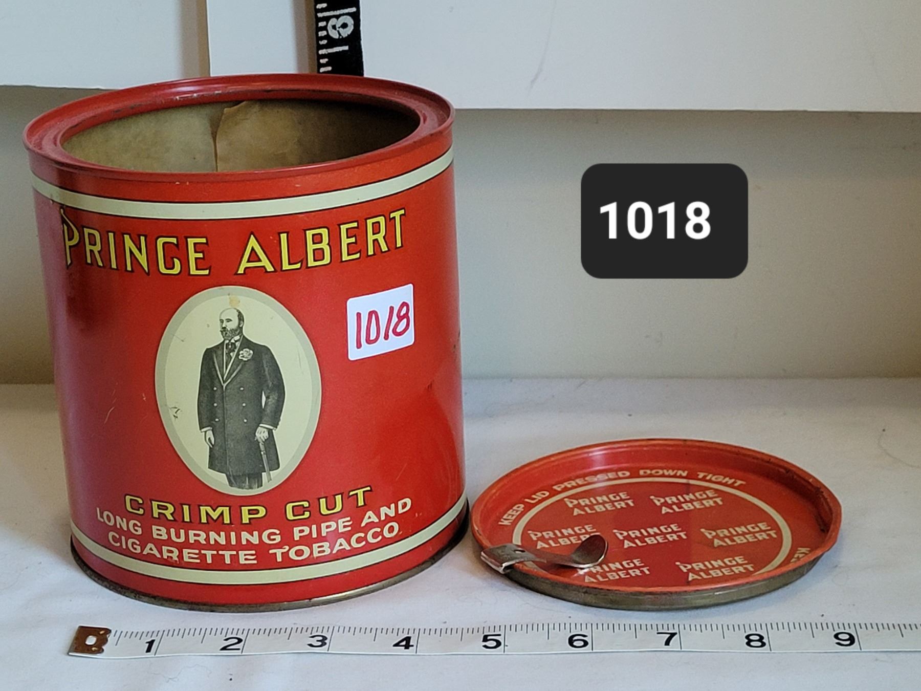 Vintage Prince Albert pipe & cigarette tobacco can with special lid opener.