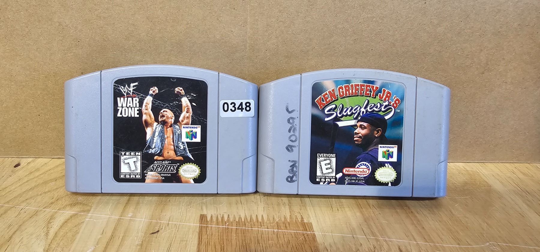 Lot of 2 N64 Games - WWF War Zone - Ken Griffey JR's Slufgest