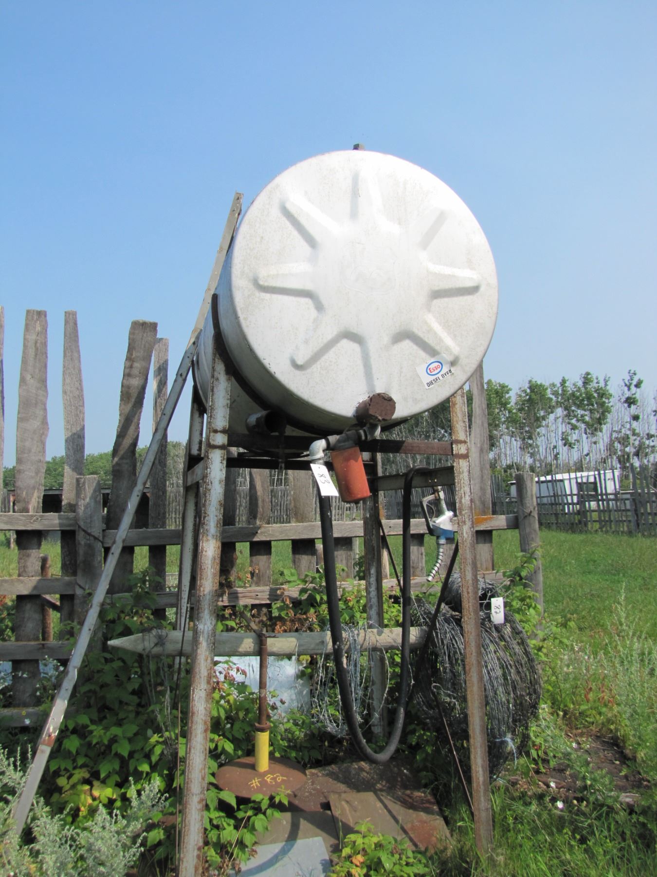 Fuel tank on stand held dyed diesel fuel