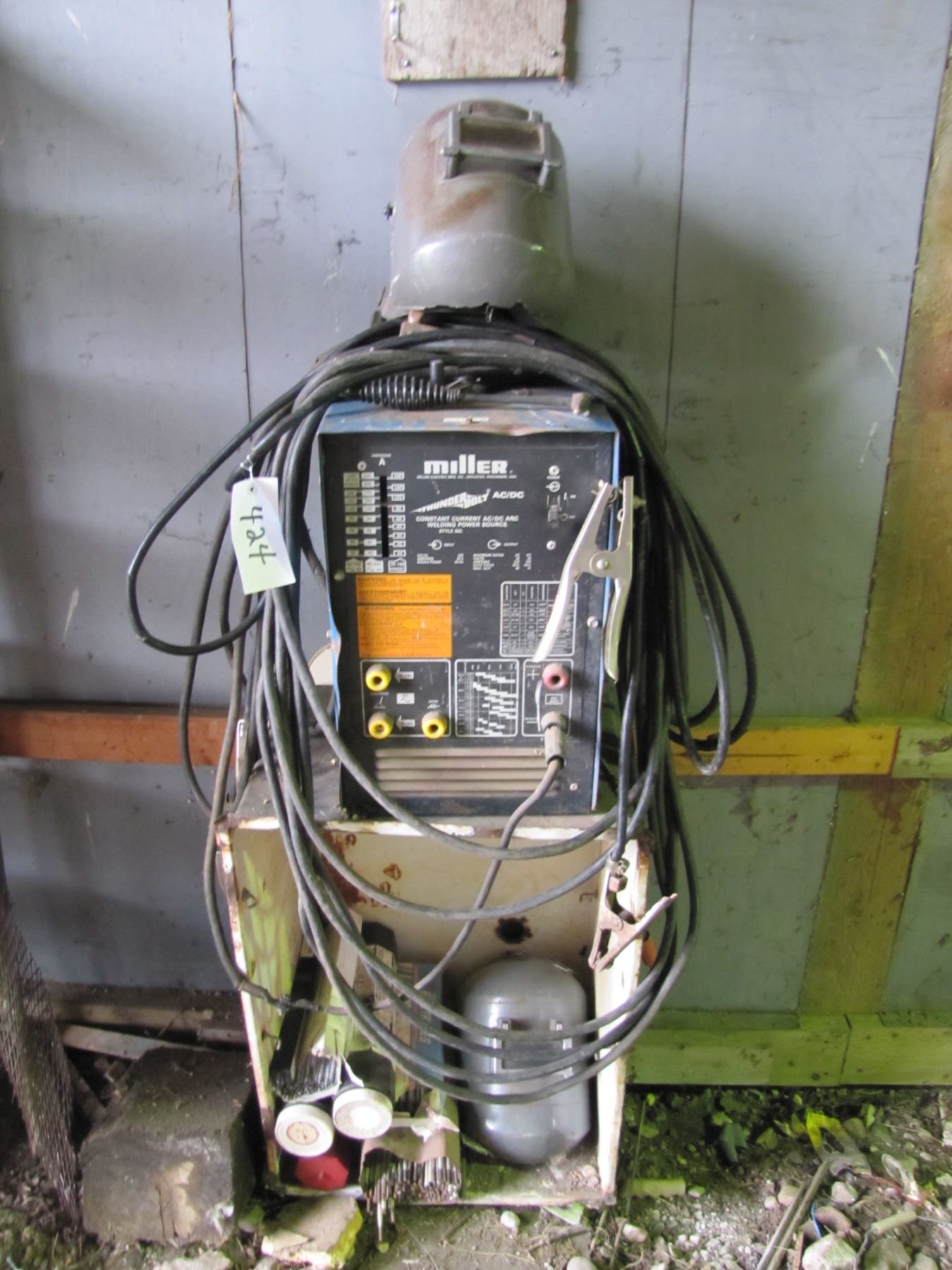 Miller Thunderbolt AC - DC arc welder with welding rods and helmet etc