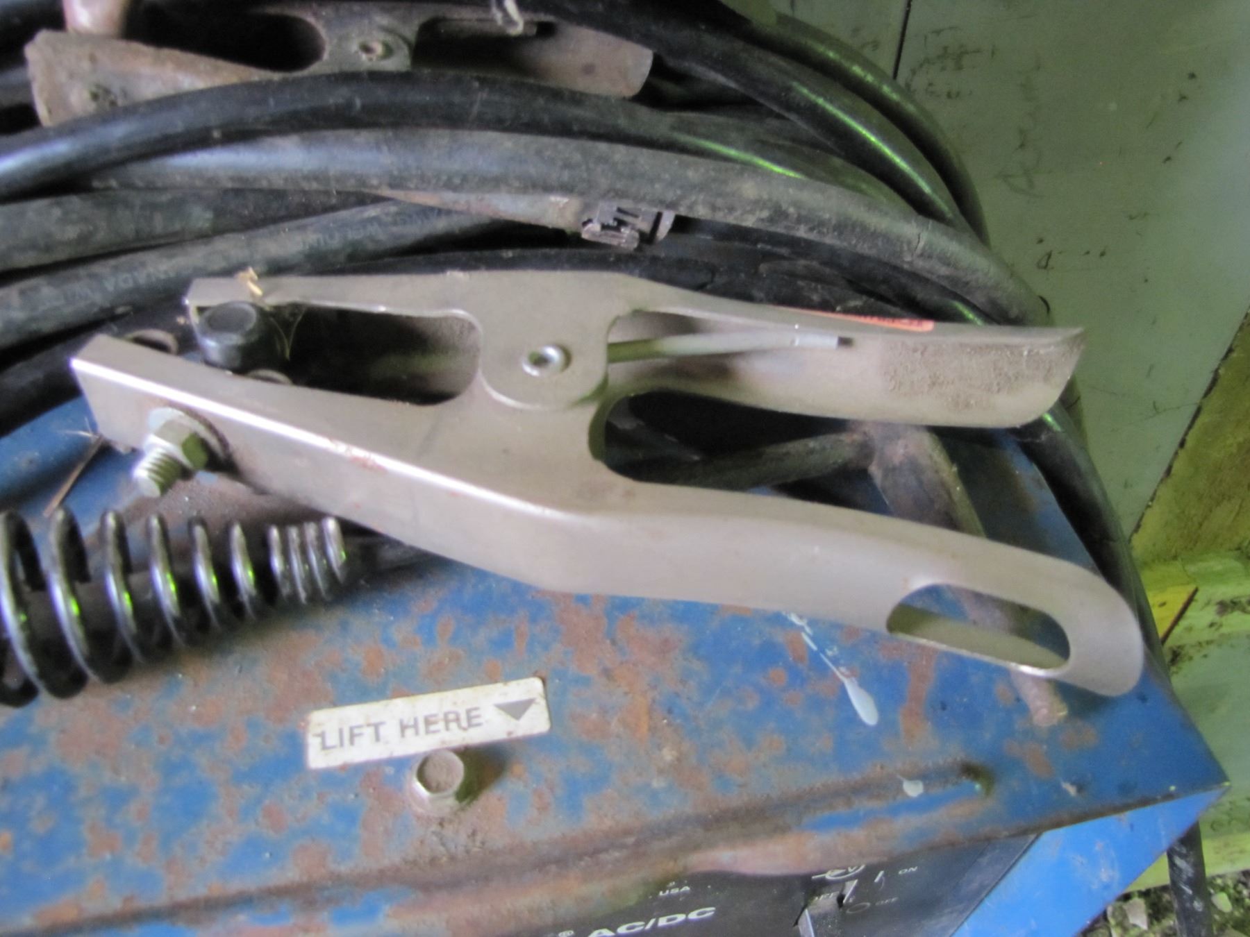 Miller Thunderbolt AC - DC arc welder with welding rods and helmet etc