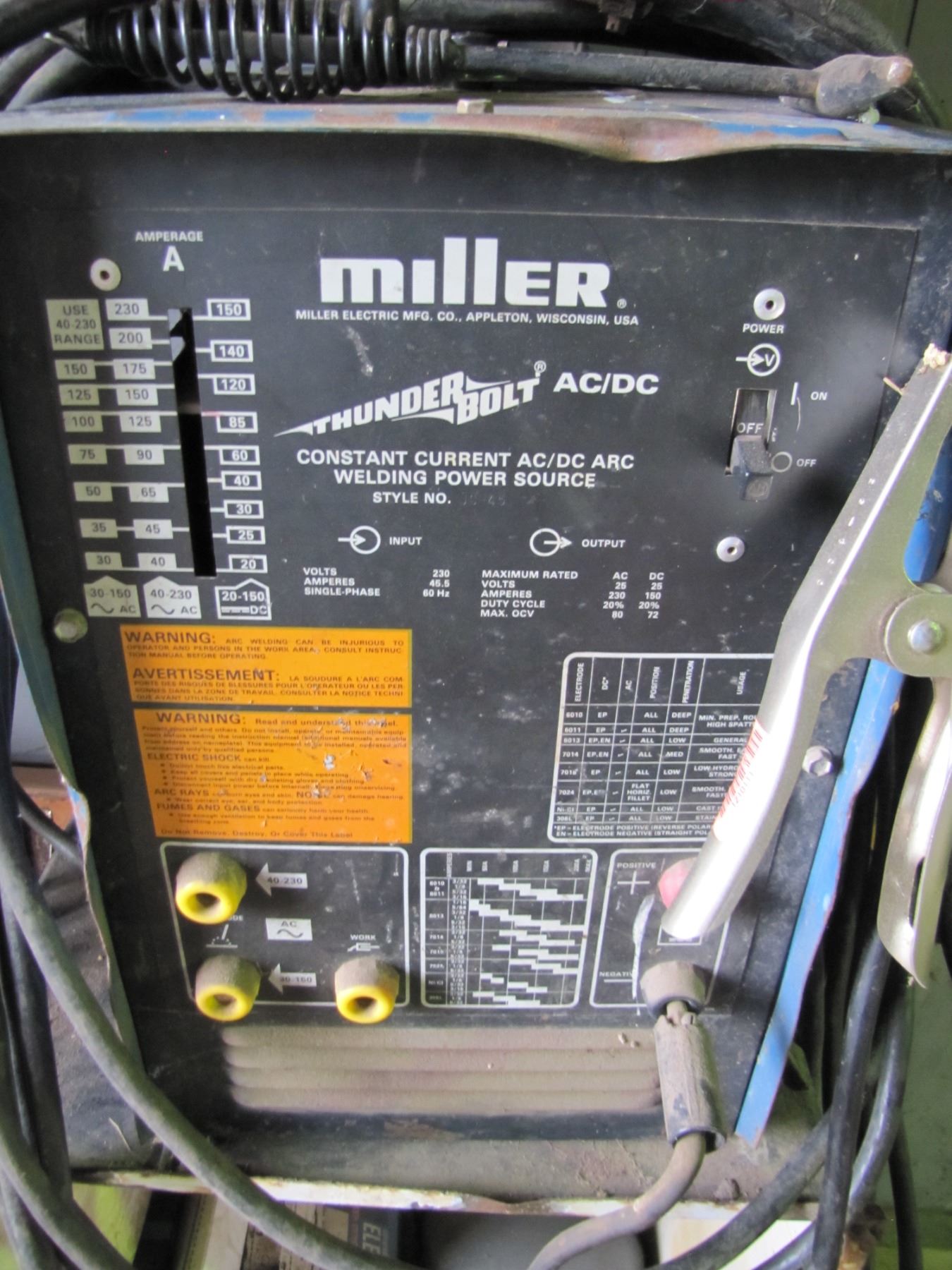 Miller Thunderbolt AC - DC arc welder with welding rods and helmet etc
