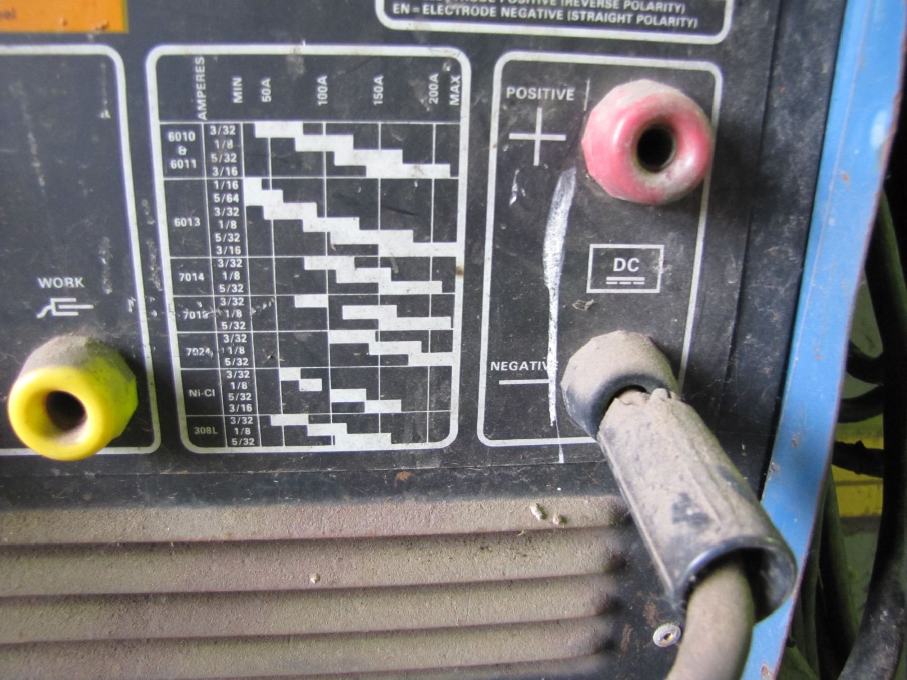 Miller Thunderbolt AC - DC arc welder with welding rods and helmet etc