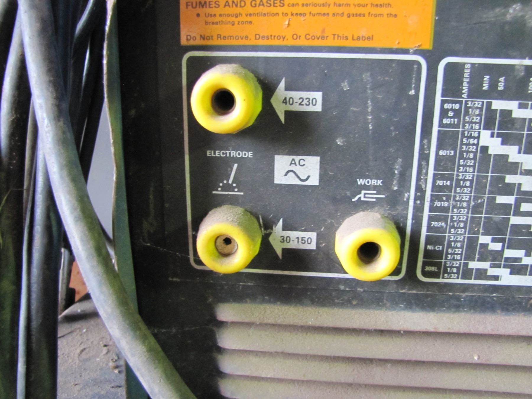 Miller Thunderbolt AC - DC arc welder with welding rods and helmet etc