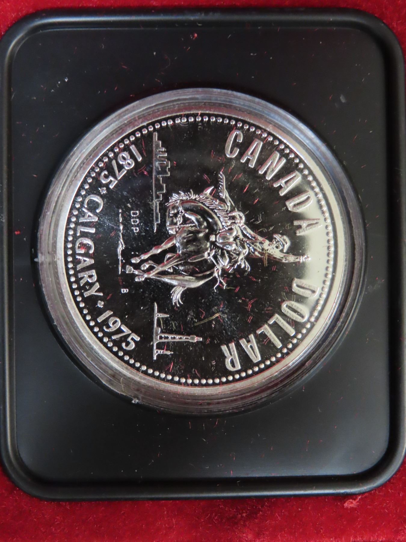1975 Calgary Centennial Specimen Silver Dollar. Bright White. Housed in ...