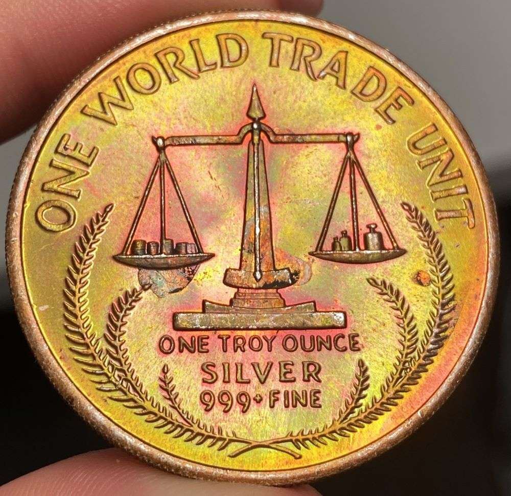 Toned 1984 World Trade Eagle One World Trade Unit 1 ozt .999 Silver