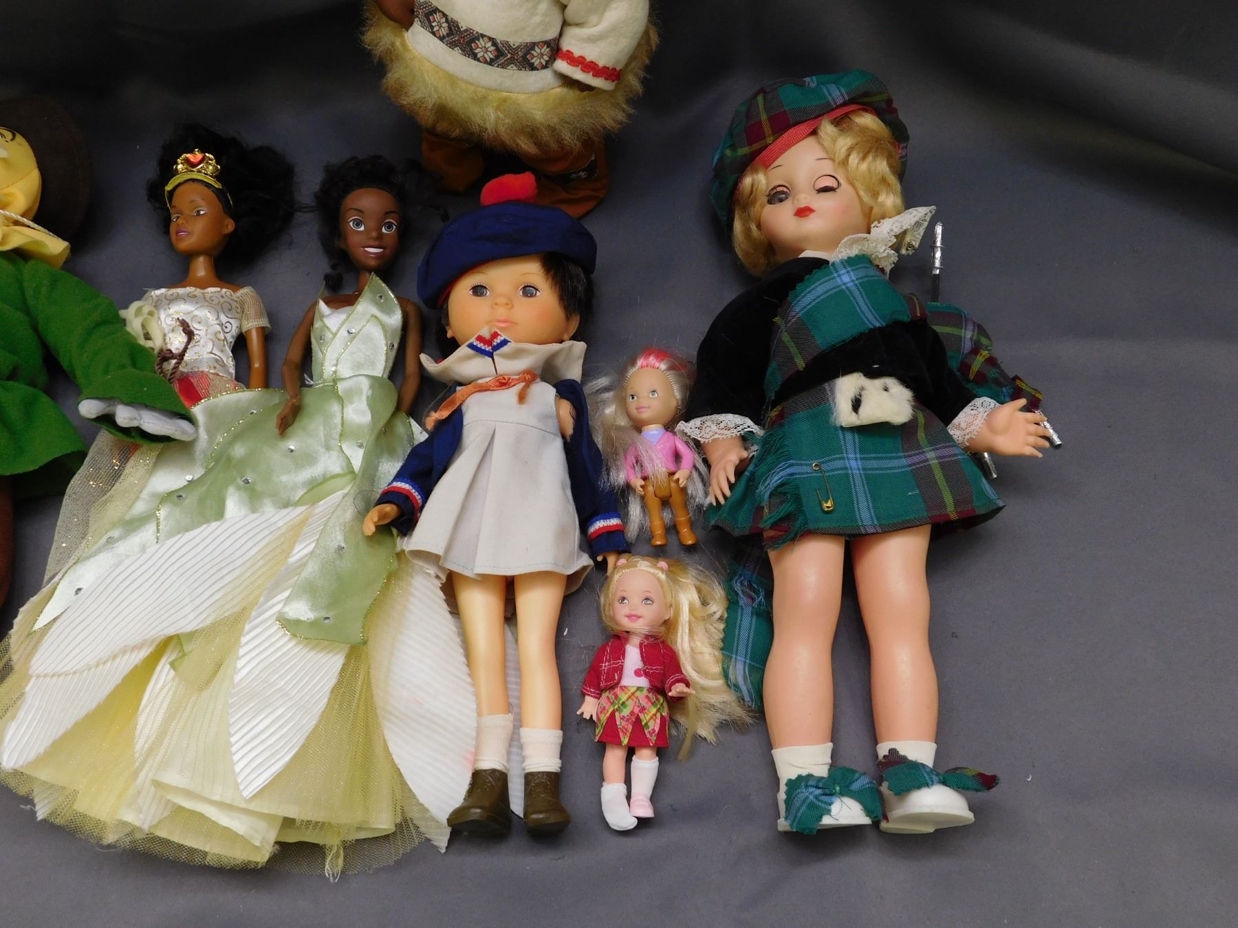 Lot of 8 Assorted Dolls Princess, Kelly, Aboriginal, Scarecrow