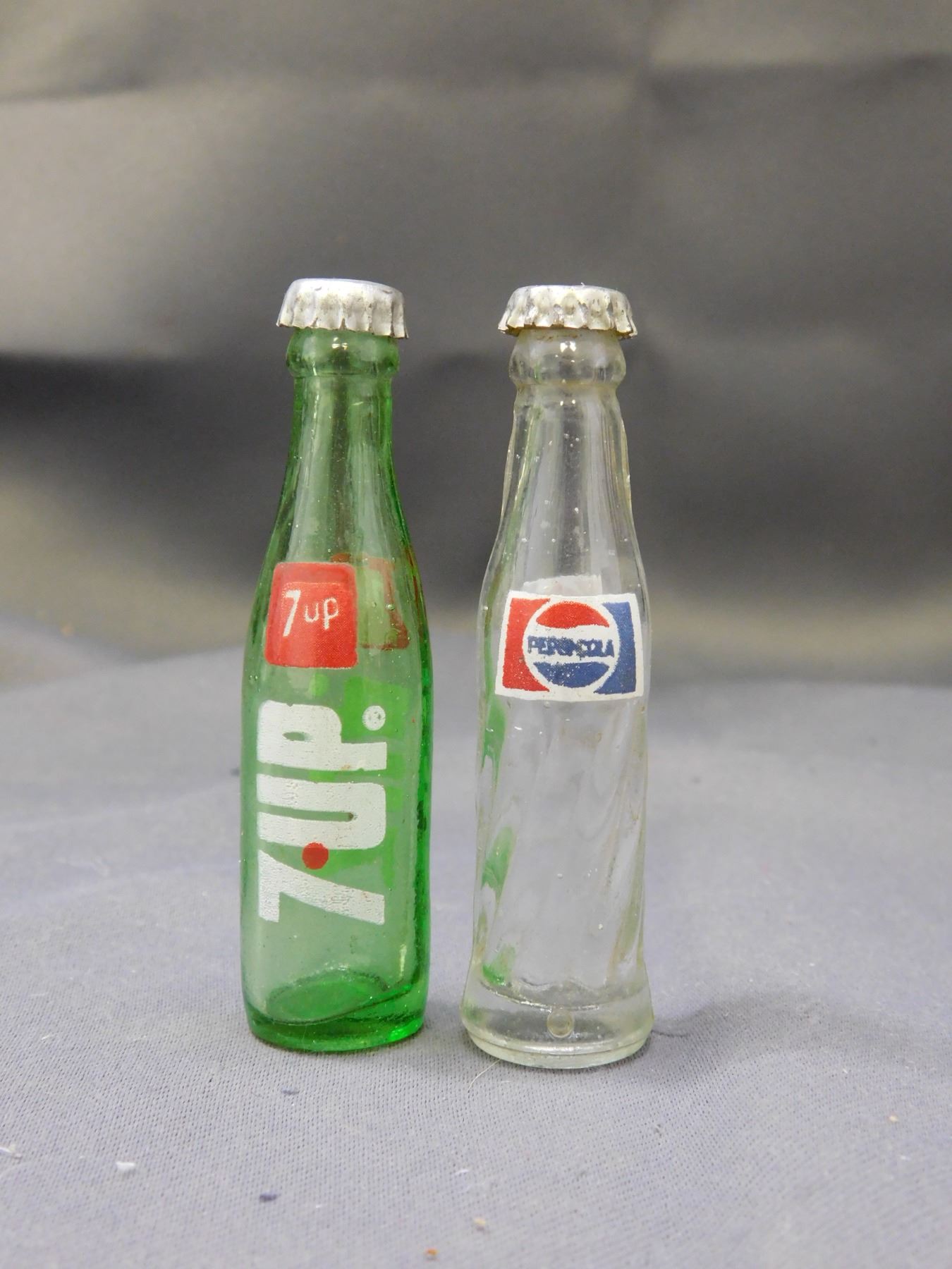 Lot of 2 Vintage Miniature Pepsi and 7UP Glass Bottles