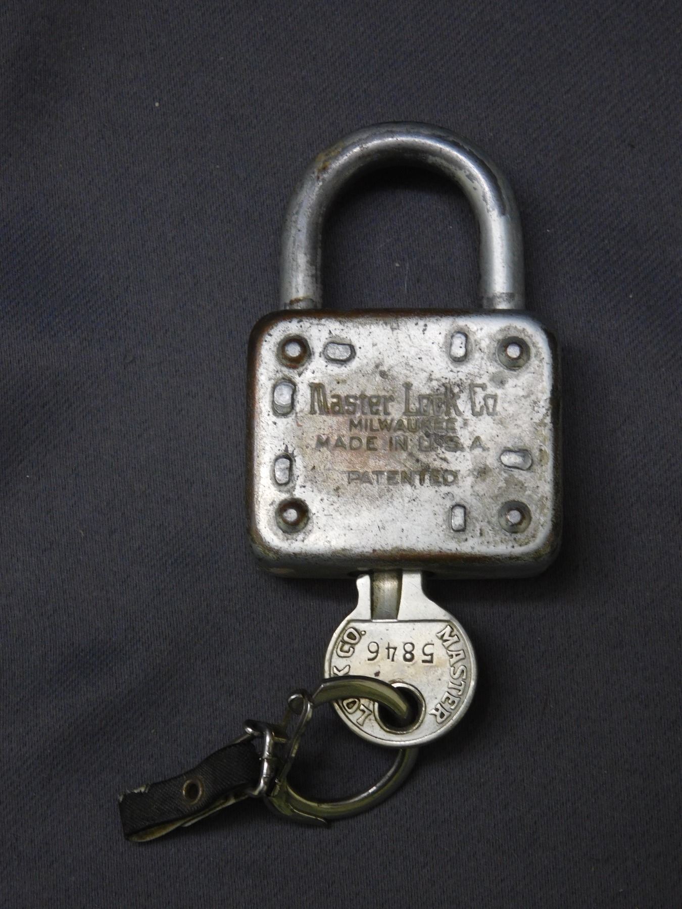 Vintage Master Lock and Key Lion Head Logo