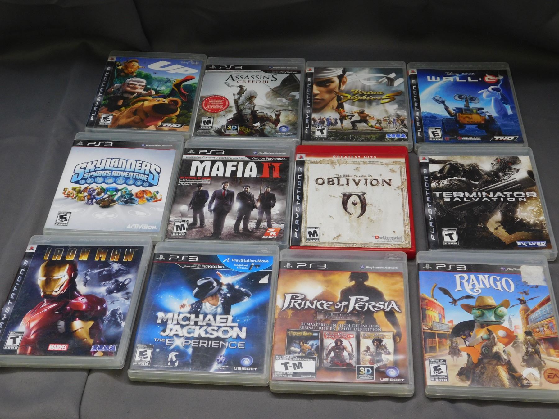Lot of 12 PS3 Games Mafia II, Elder Scrolls, Wall-E, Rango, Terminator, Skylanders, Etc
