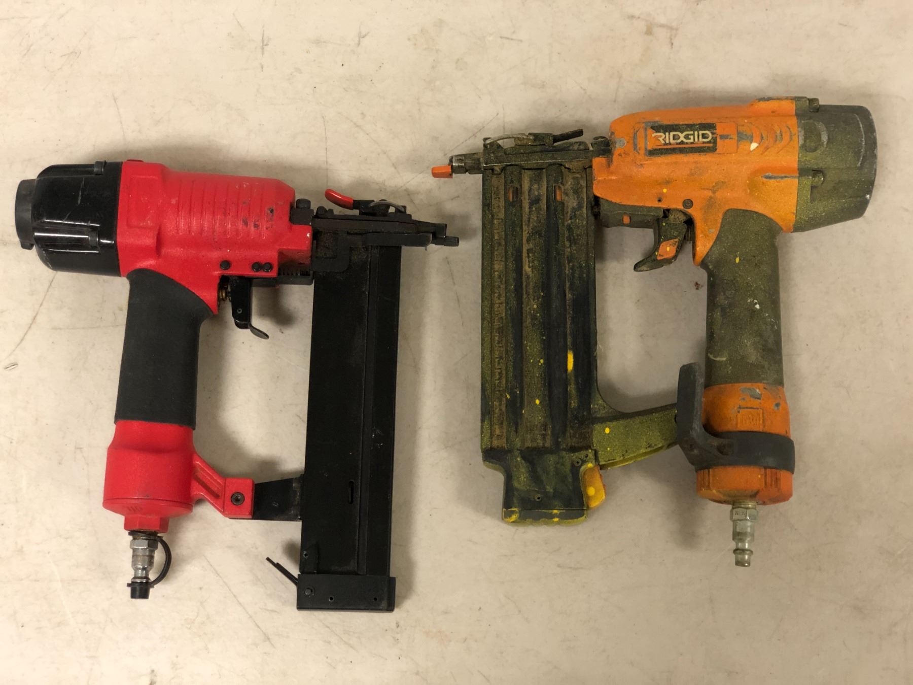 Group of 2 nail guns - includes Ridgid brad nailer - model R213BNA & Ga ...