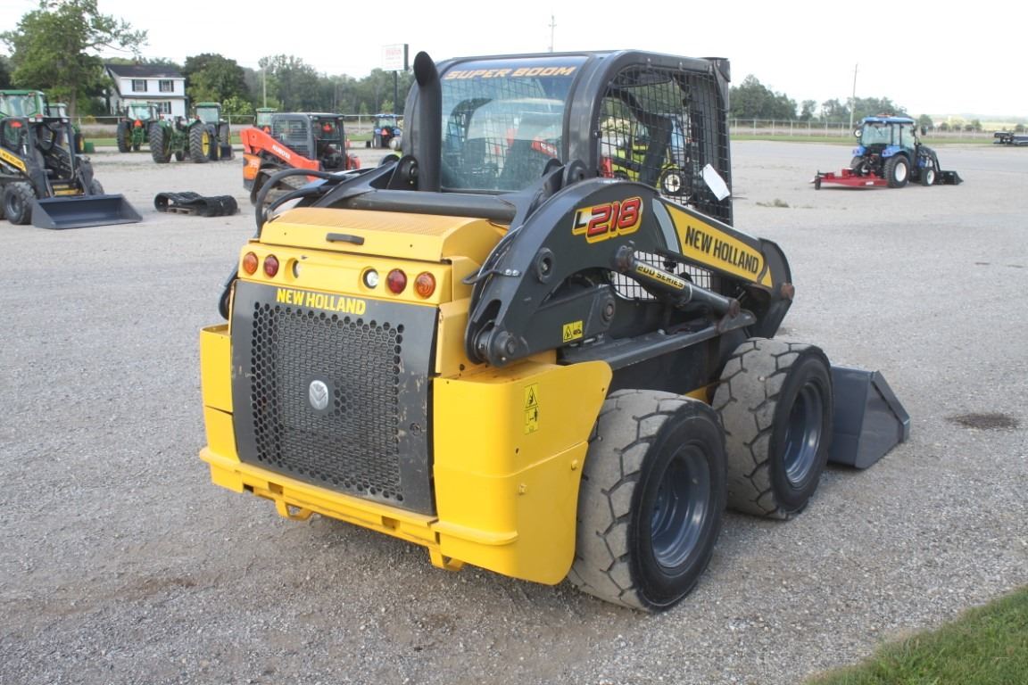 New Holland L218 skidsteer, rops, 2 Speed, aux hyd, 12-16.5, 72" bucket ...