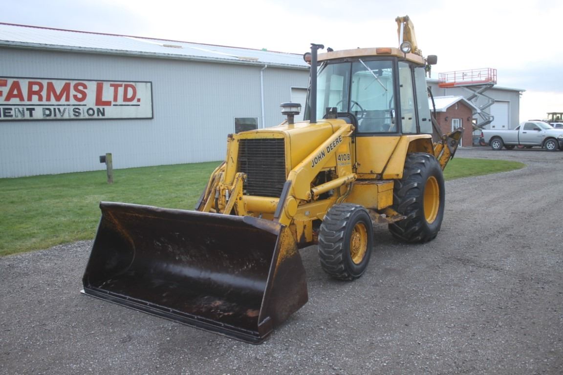 JD 410B 4wd backhoe, cab, extendahoe, 19.5x24, 5352 hours