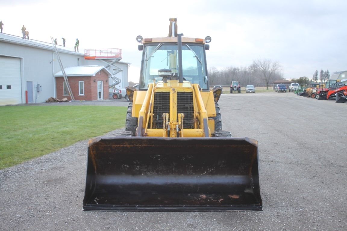 JD 410B 4wd backhoe, cab, extendahoe, 19.5x24, 5352 hours