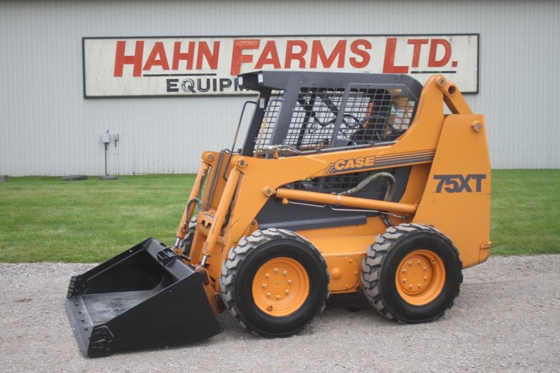 Case 75XT skidsteer, rops, 12x16.5, 72" bucket, hand controls, aux ...