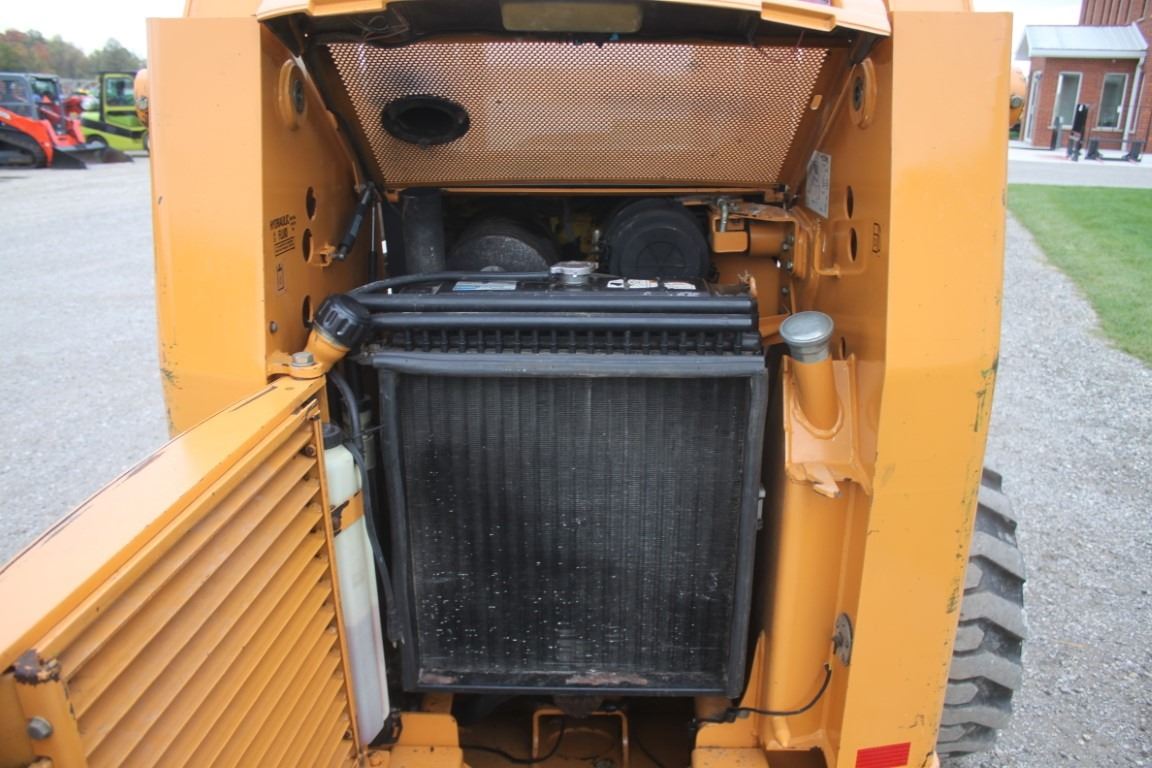 Case 75XT skidsteer, rops, 12x16.5, 72" bucket, hand controls, aux ...