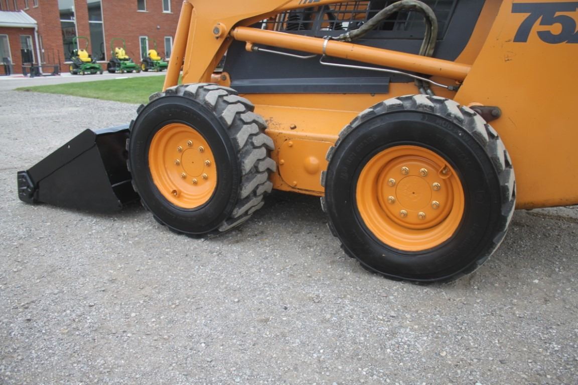 Case 75XT skidsteer, rops, 12x16.5, 72" bucket, hand controls, aux ...
