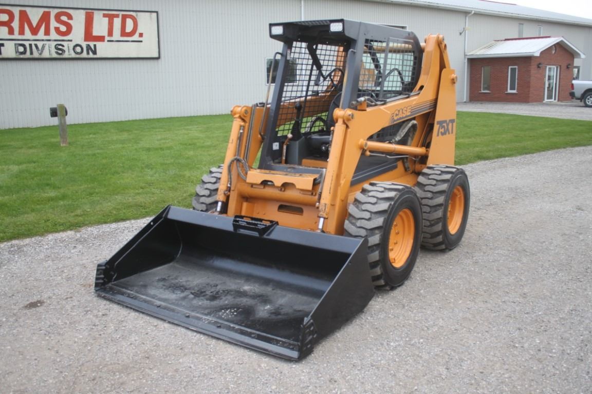 Case 75XT skidsteer, rops, 12x16.5, 72" bucket, hand controls, aux ...