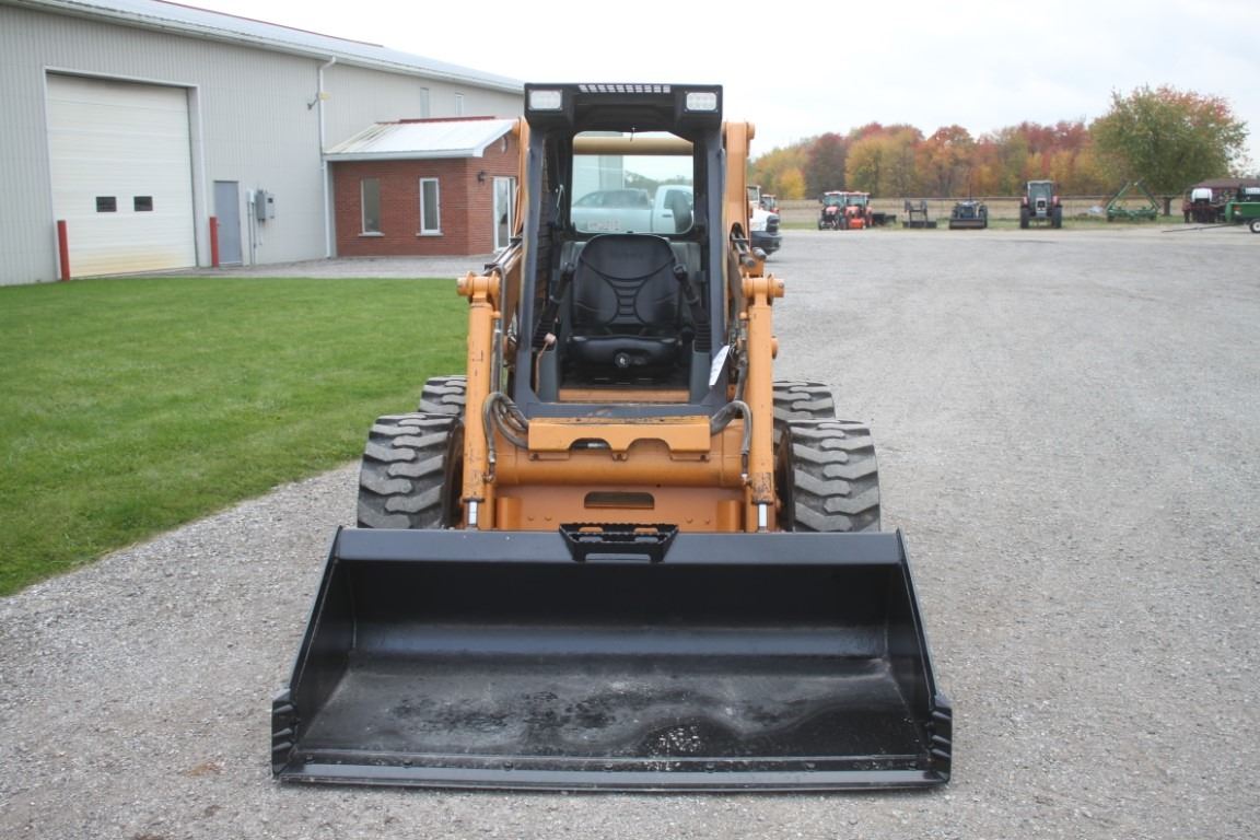 Case 75XT skidsteer, rops, 12x16.5, 72" bucket, hand controls, aux ...
