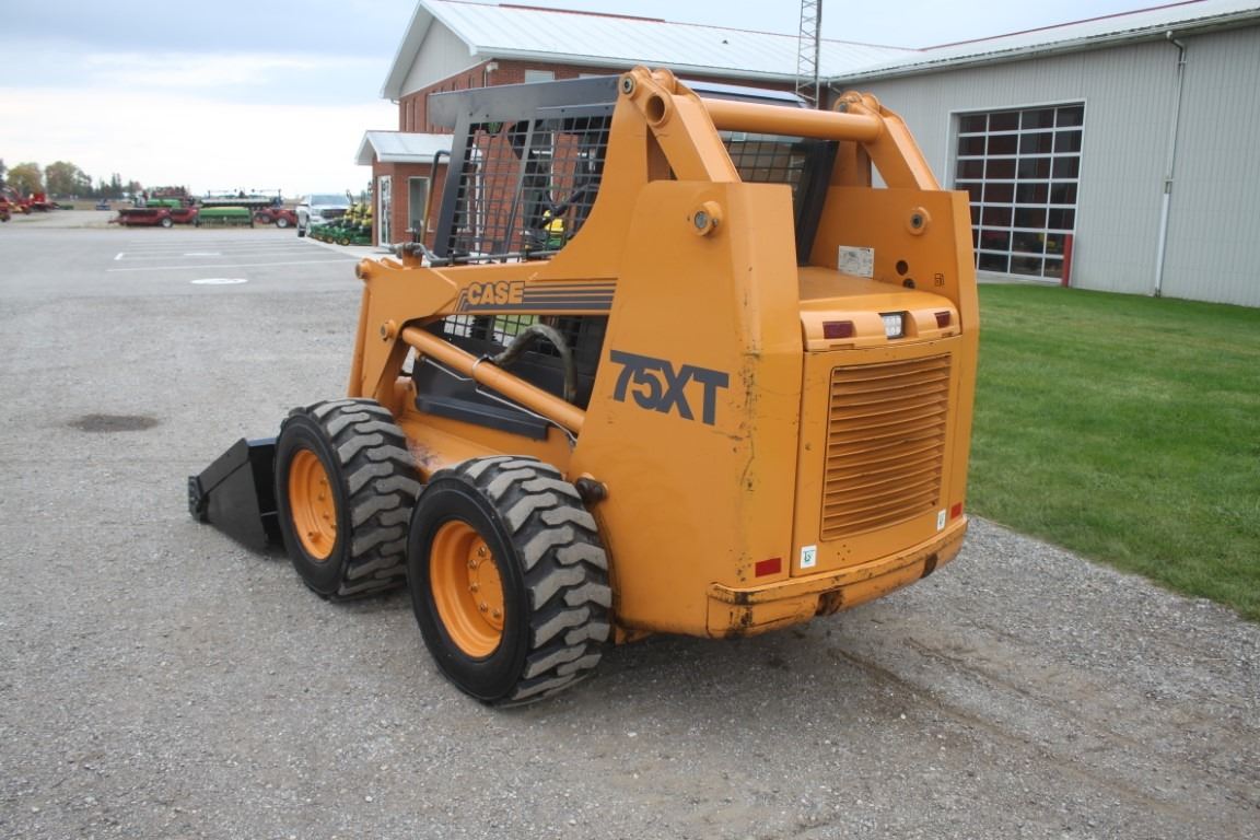 Case 75XT skidsteer, rops, 12x16.5, 72" bucket, hand controls, aux ...