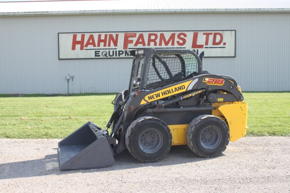 New Holland L218 skidsteer, rops, aux hyd, 2 speed, 12-16.5, 72" bucket ...