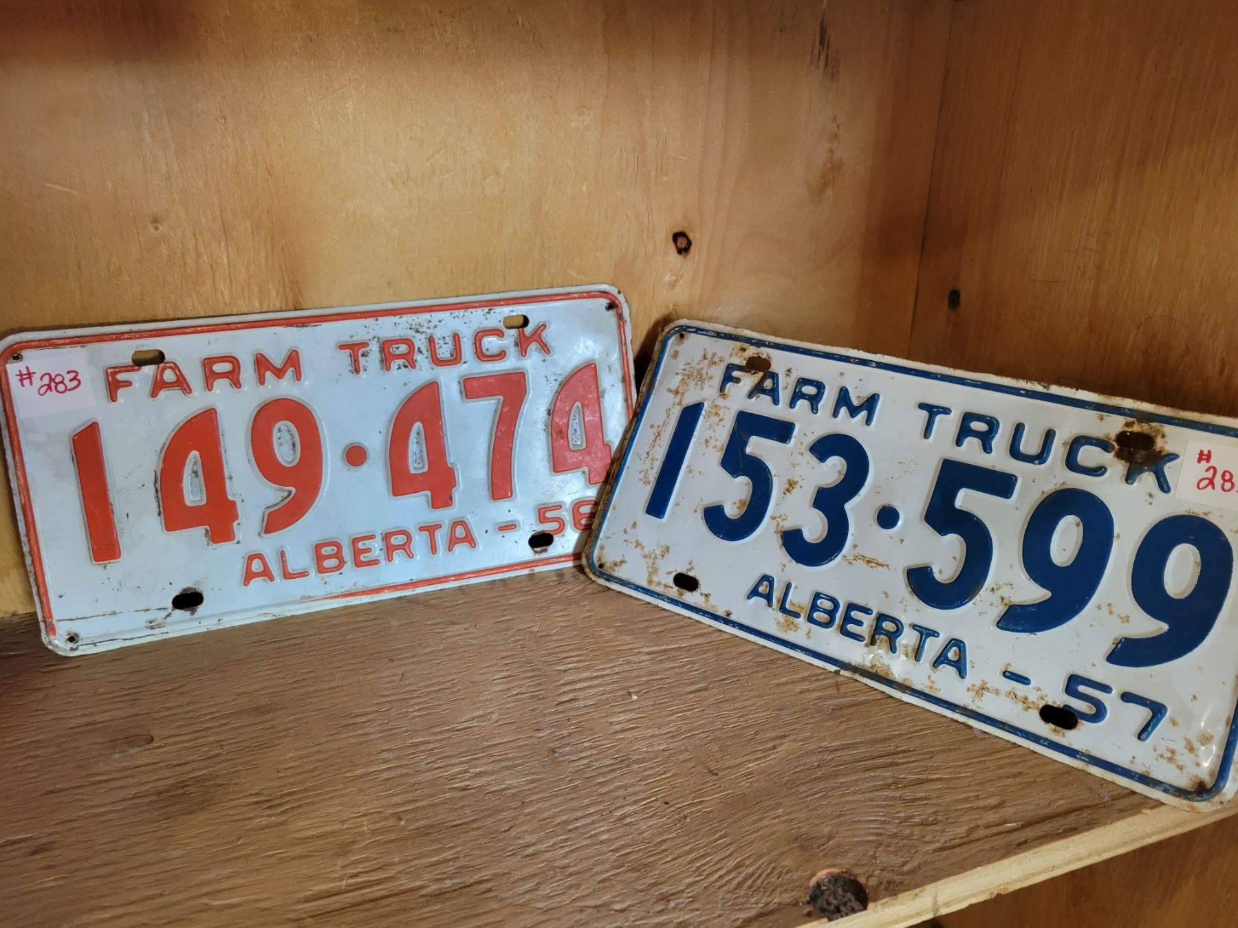 1 1956 and 1 1957 FARM TRUCK PLATES