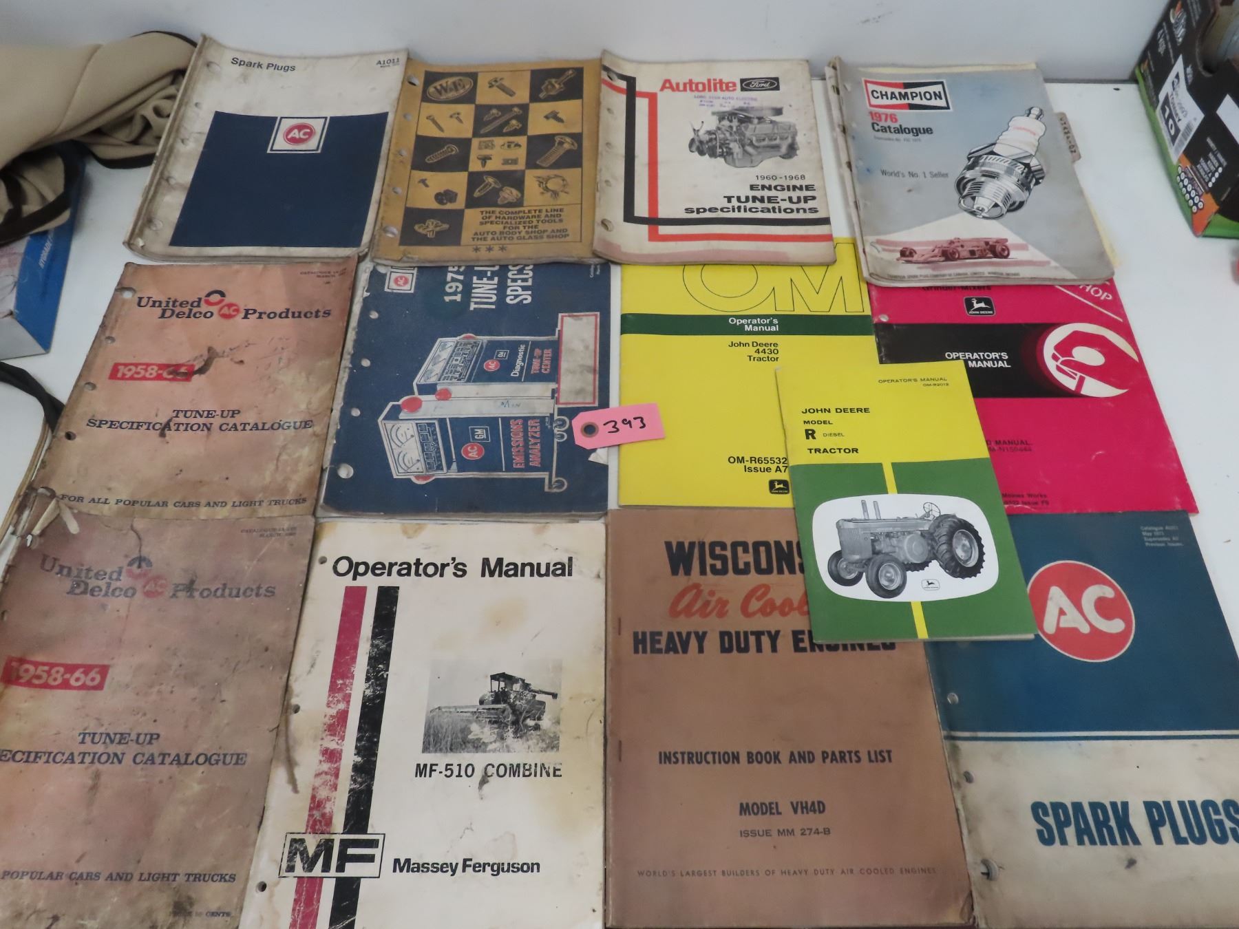 John Deere manual book, Delco parts, spark plug parts - Schmalz Auctions