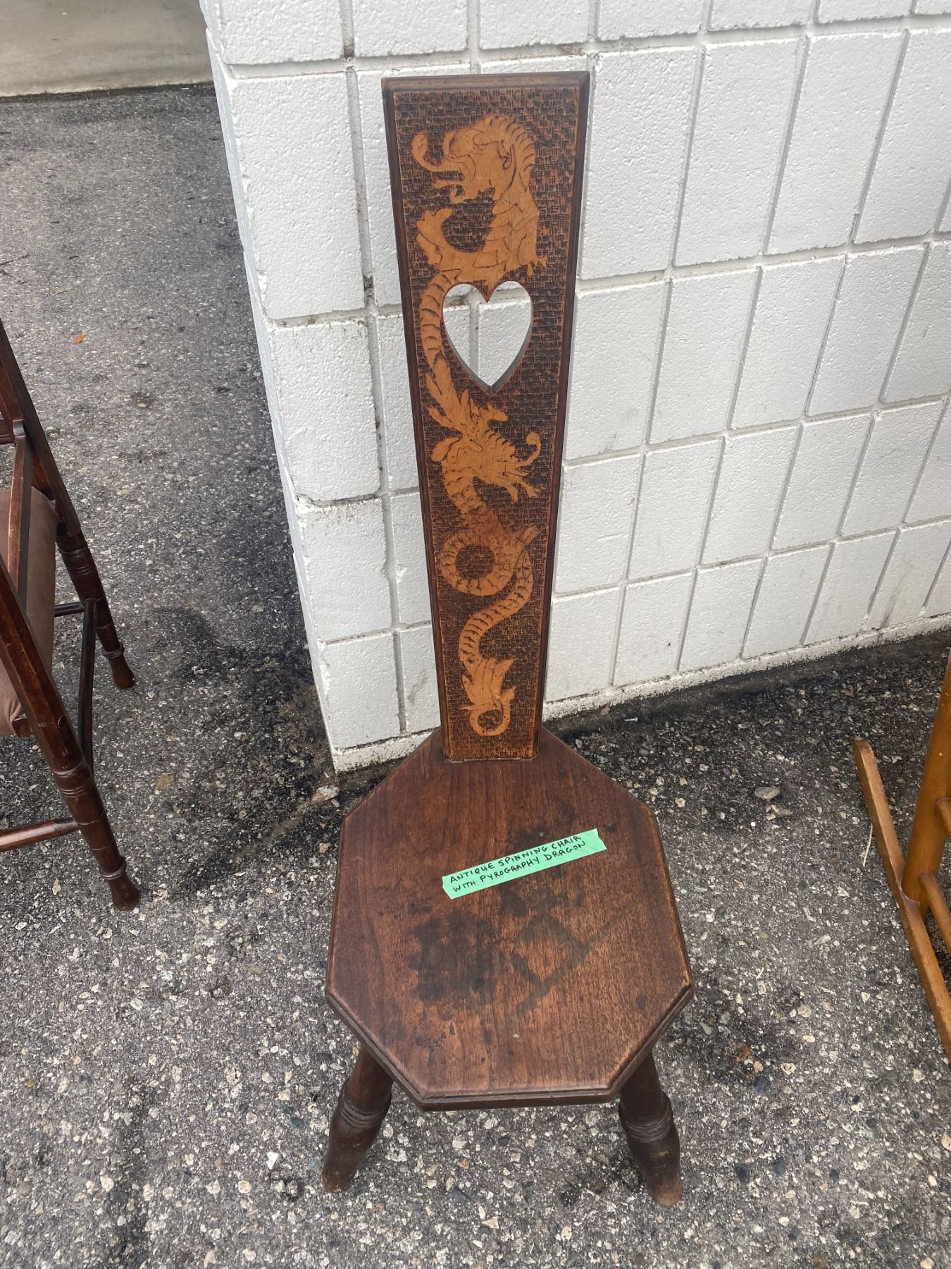 Antique spinning chair with pyrograhy dragon