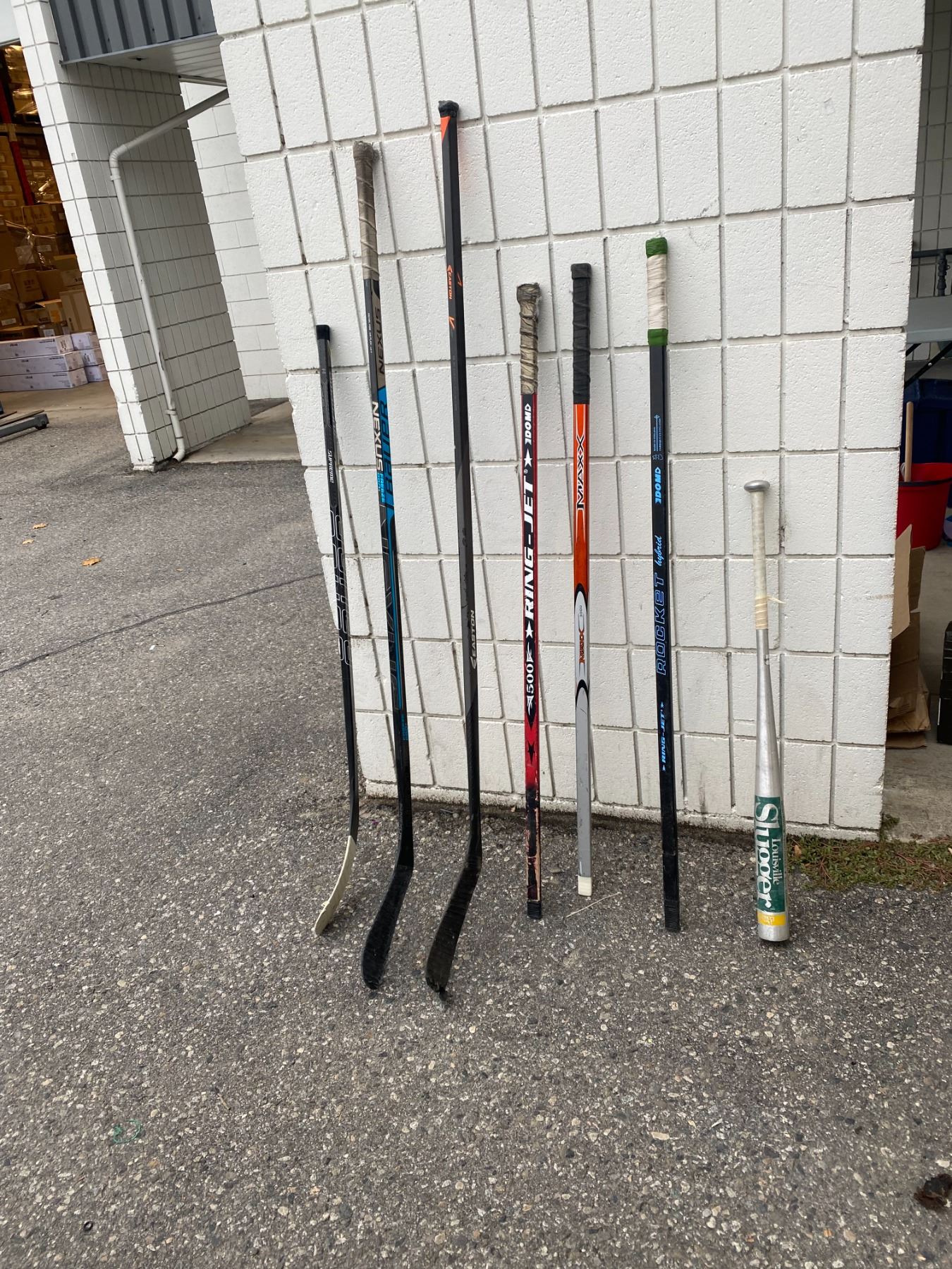 Hockey and ringette sticks, baseball bat etc