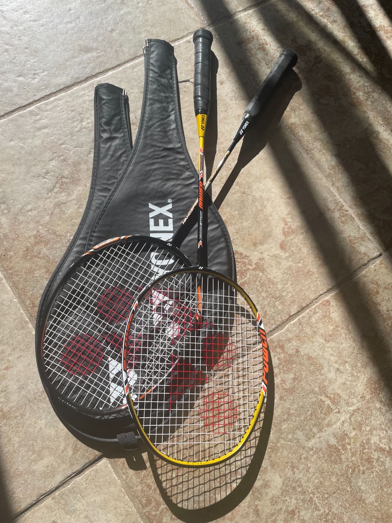 Two Badminton Rackets with Covers