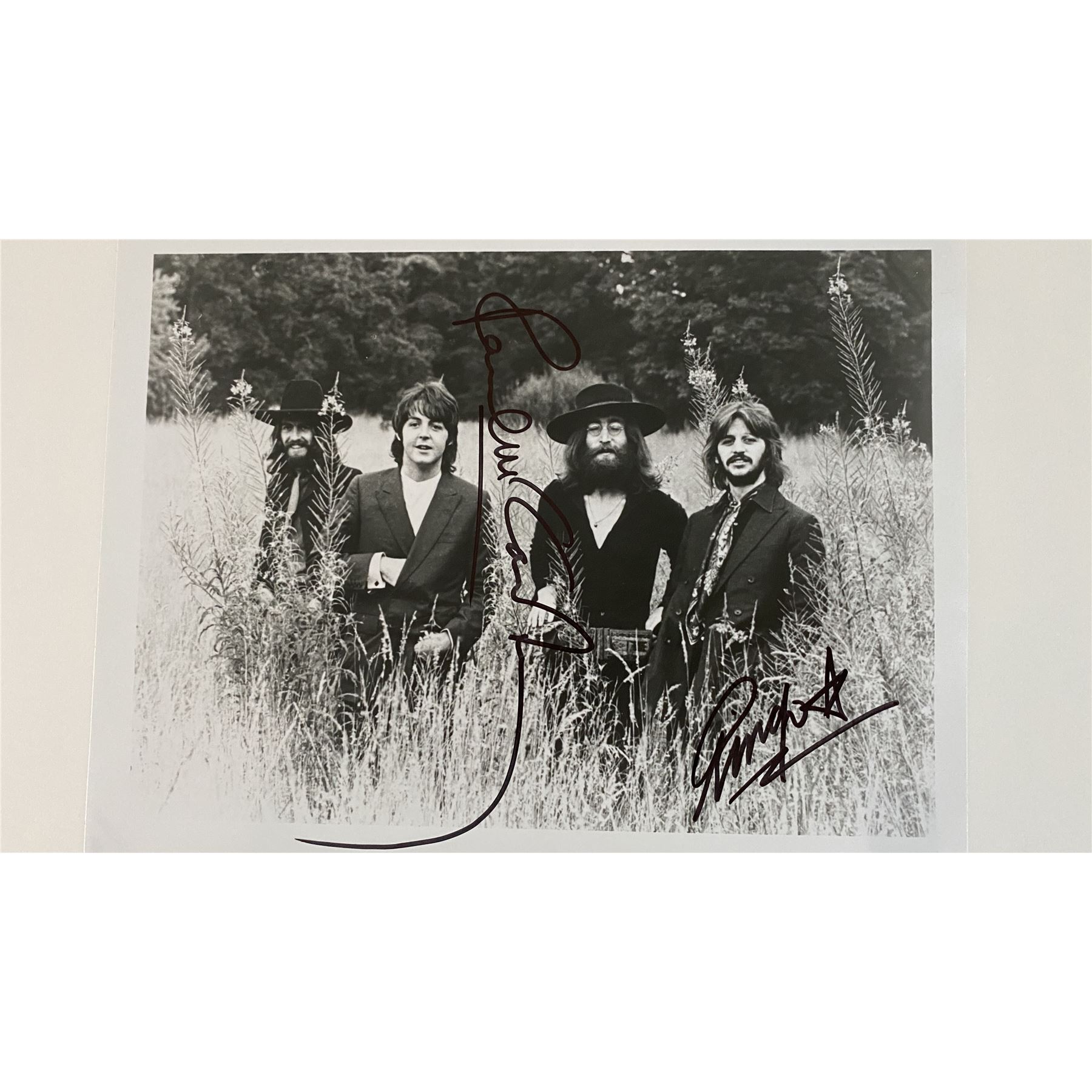 The Beatles rare band photo. GFA Authenticated