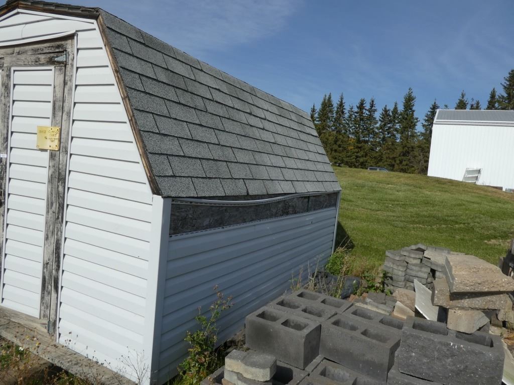wooden barn style 10' x 12' shed on skids