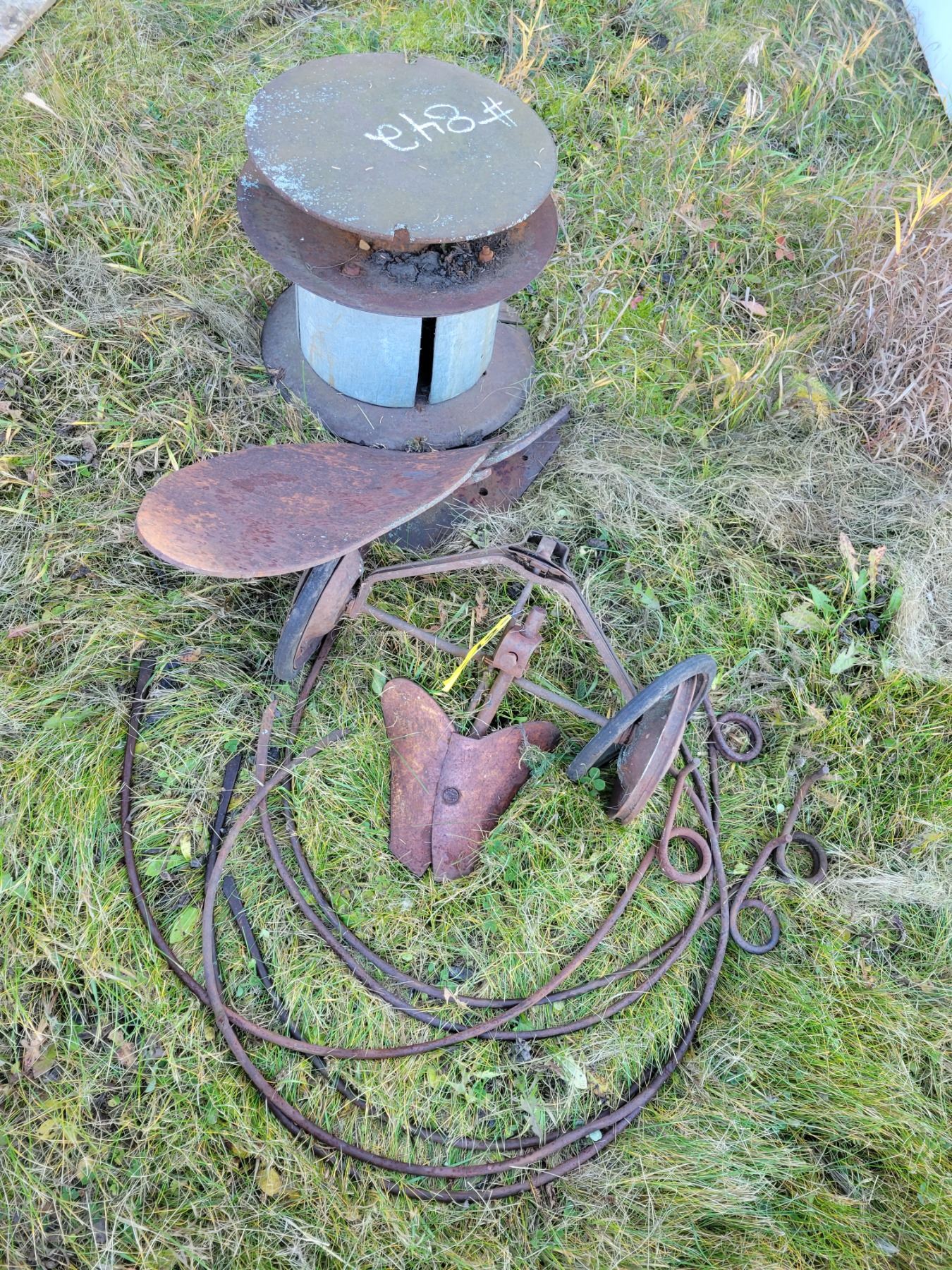 Steel reel, curved tines, old 2 wheel cart