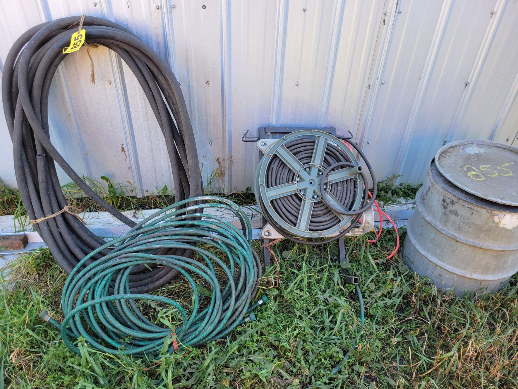 Alum. Ladder, heavy rubber hose, hose reel, garden hose, barrel