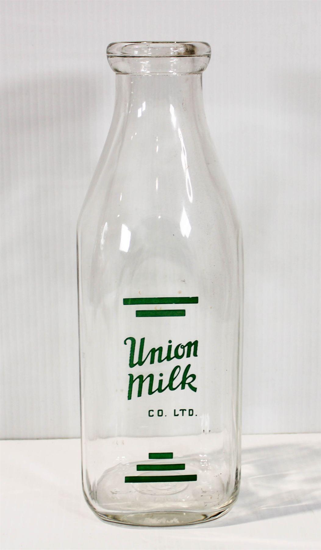 GLASS UNION MILK CO. LTD MILK BOTTLE