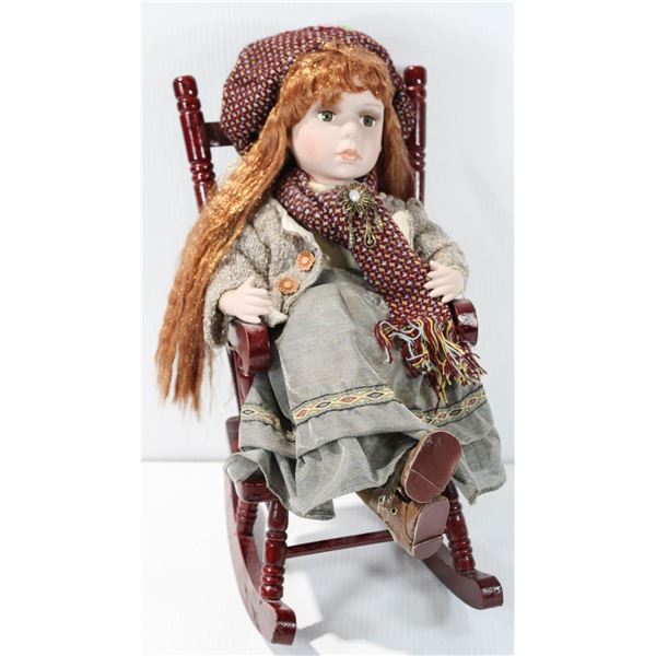PORCELAIN DOLL ON A ROCKING CHAIR