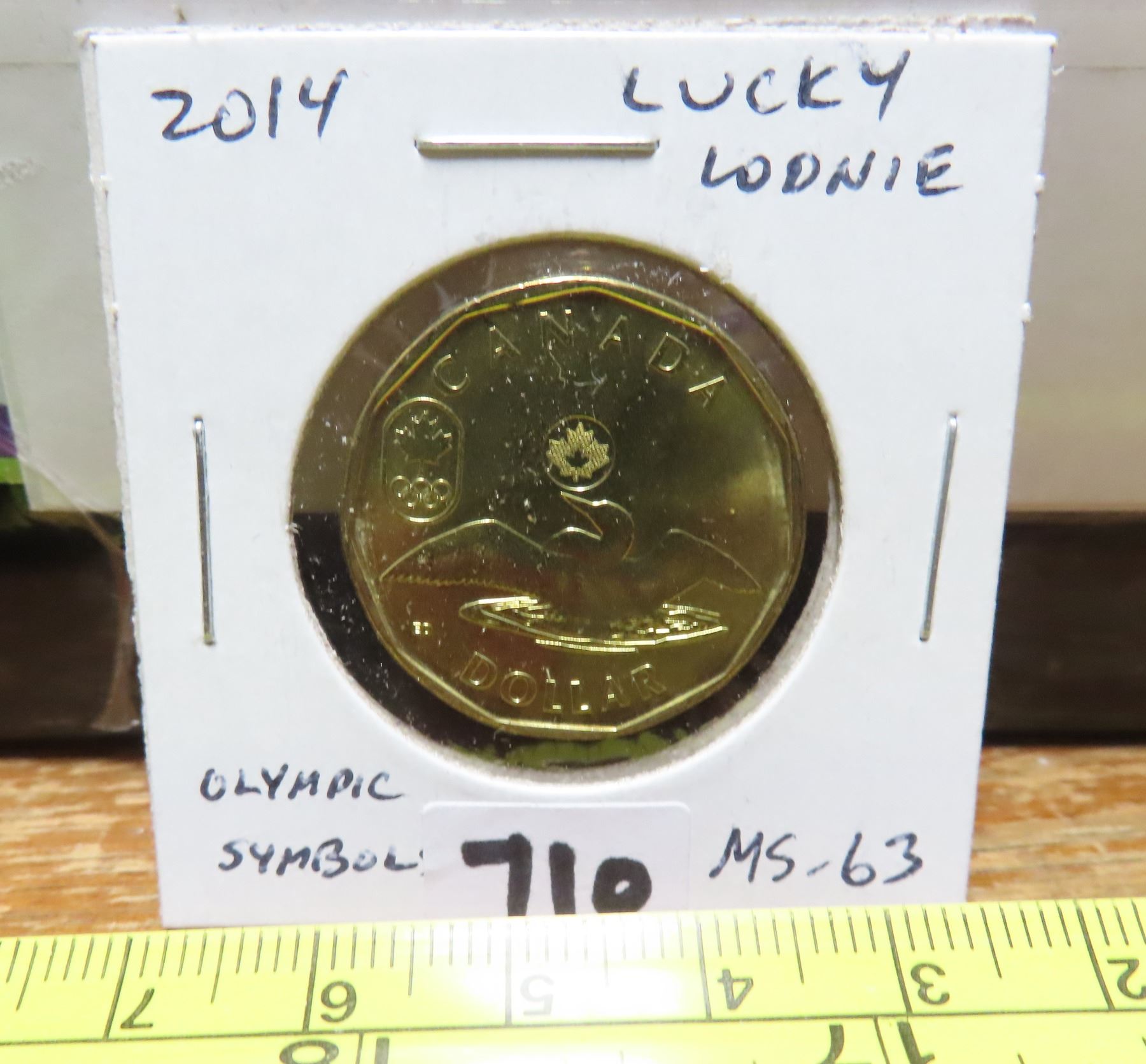 2014 Lucky Loonie Dollar. Olympic symbols. MS-63. - Schmalz Auctions