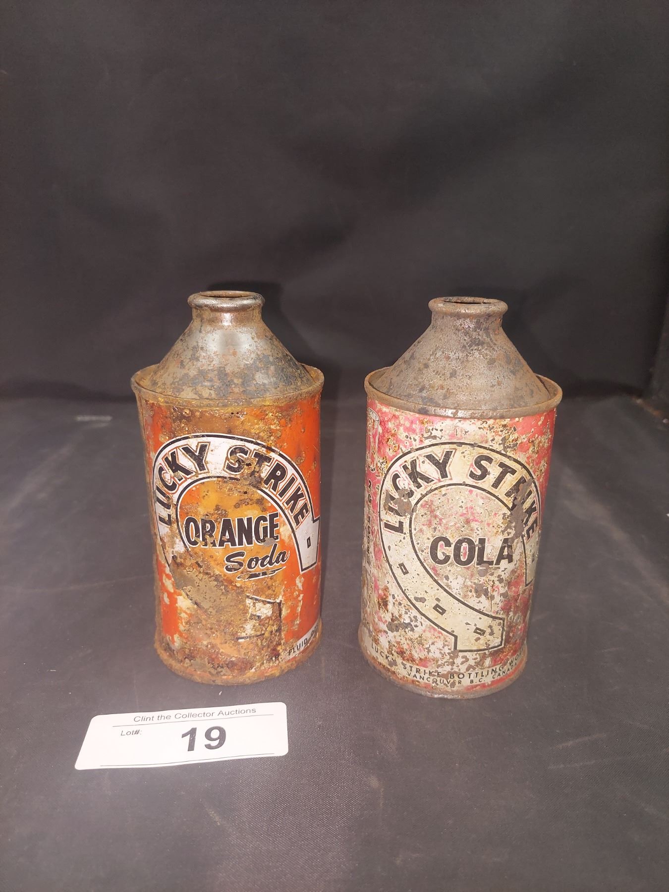 Pair of antique Lucky Strike Cola screw top cans