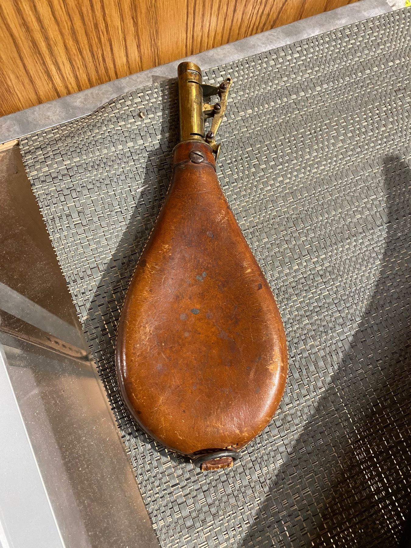 Antique leather shot flask