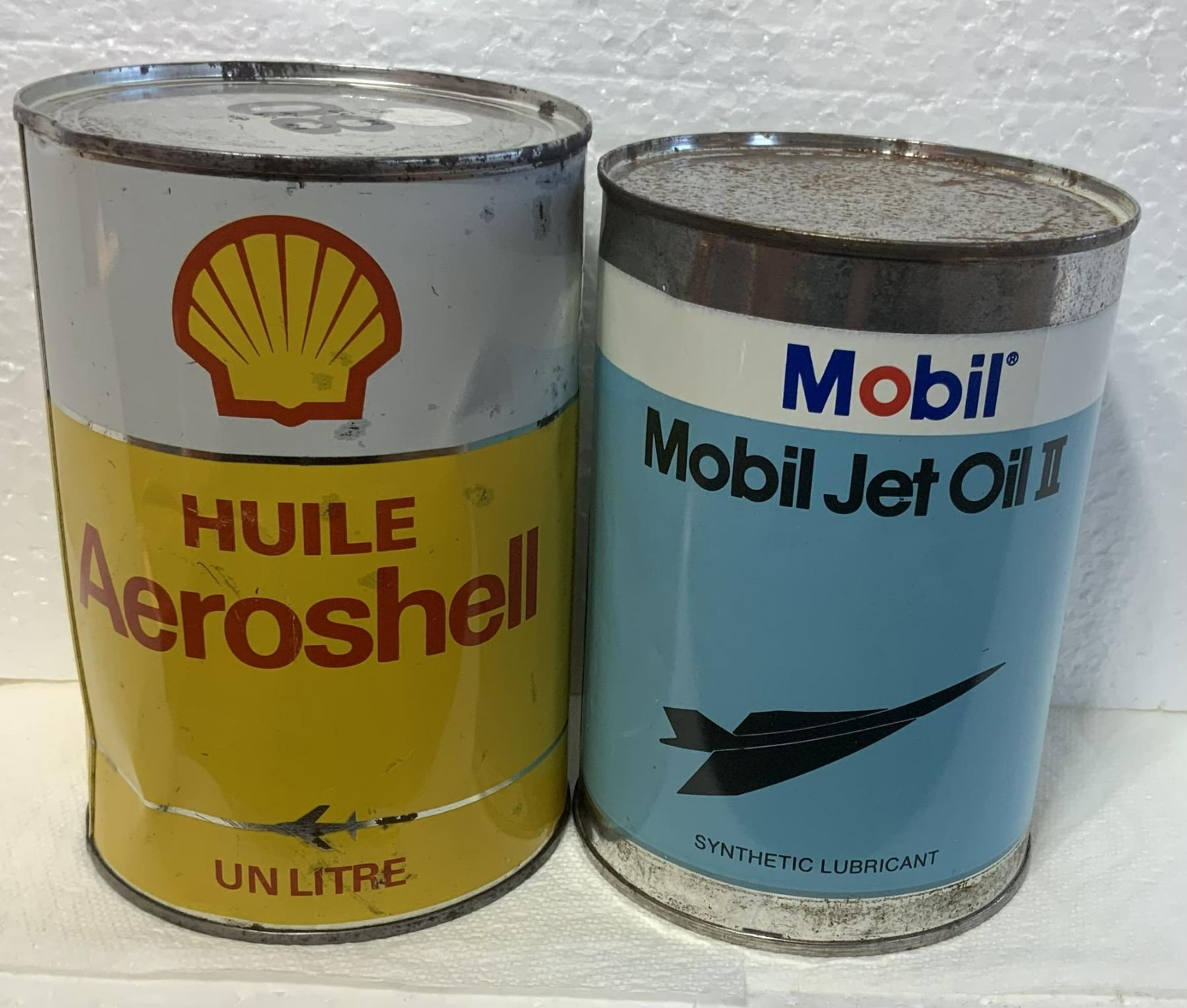 Aviation oil tins, both full - Schmalz Auctions