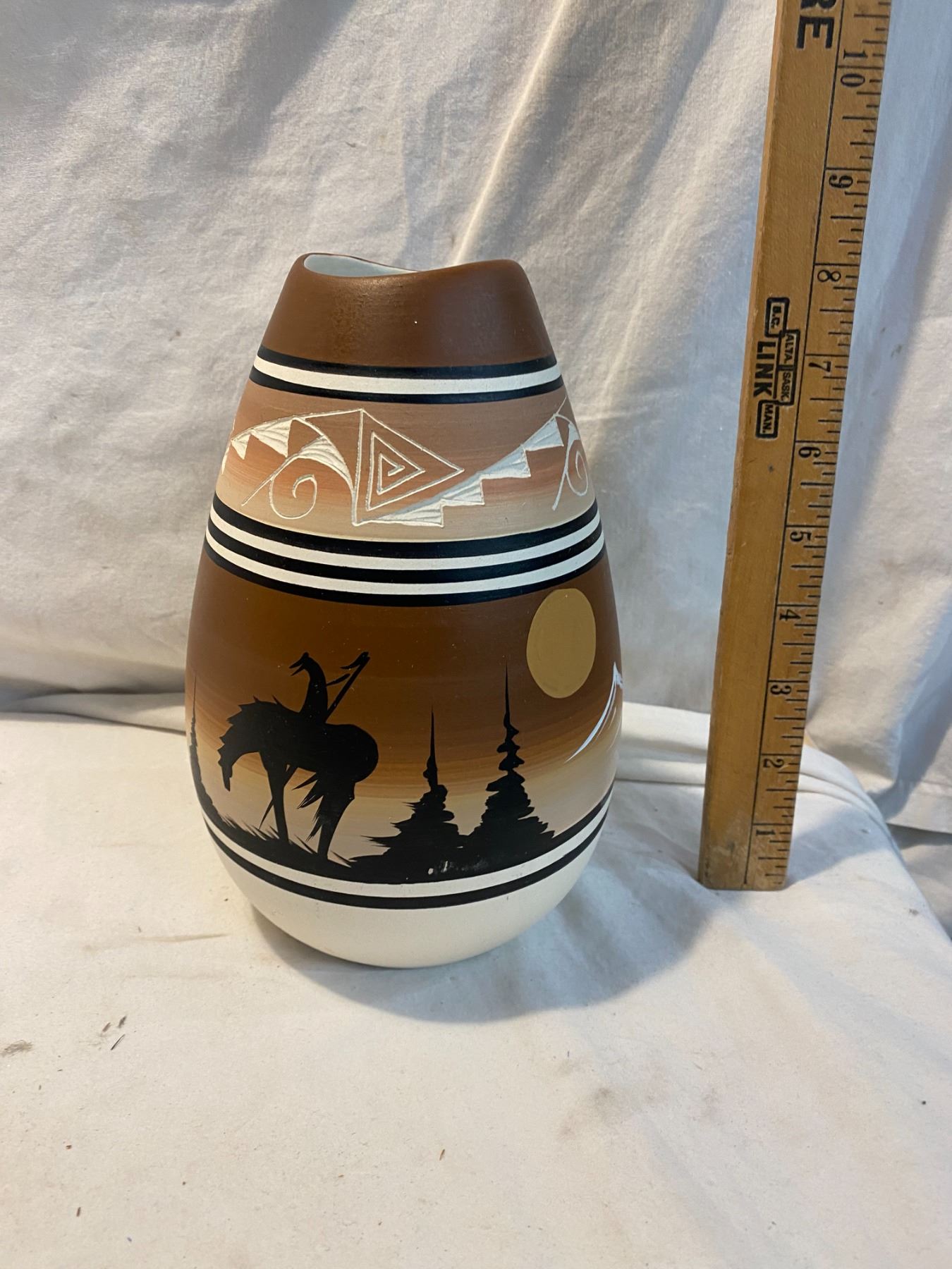 Signed pottery vase