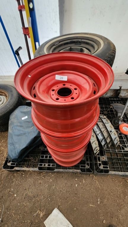 Set of red rallye wheels with chrome trim rings