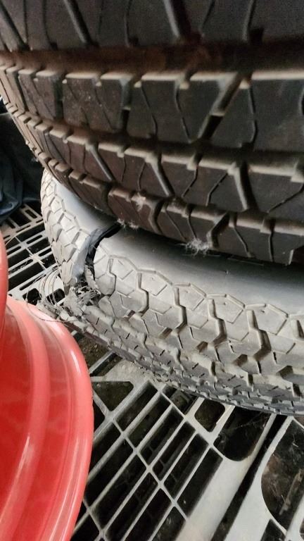 Set of 3 P225/75 R15 tires w/ 4 steel rims