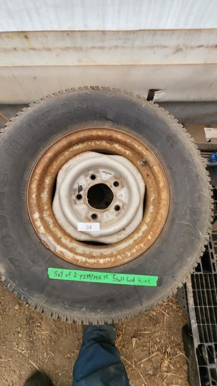 Set of 2 P235/75 R15 tires w/ 5 bolt ford rims